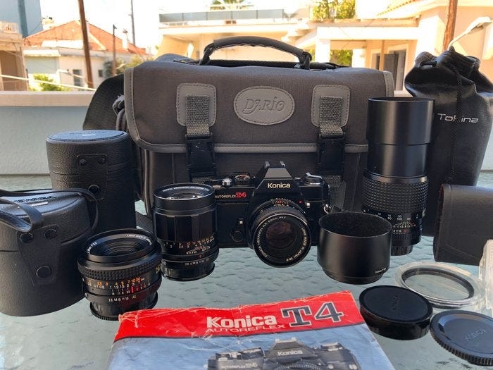 Konica Autoreflex T4 + 4 lenses + acc. multiple items | Analogt kamera ...