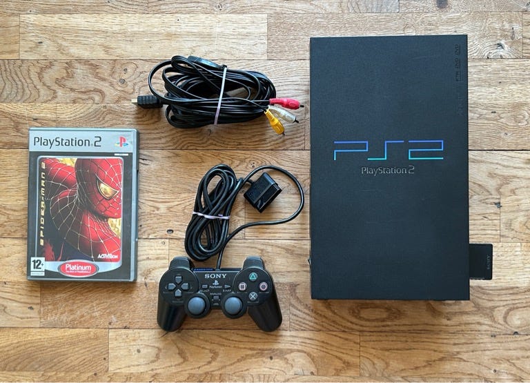 PlayStation 2 konsol + spil | DBA