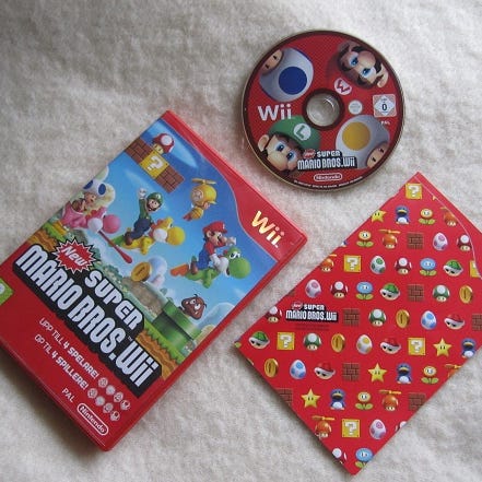 New Super Mario Bros. Wii – originalt spil i æske – god stand | DBA