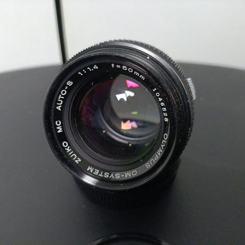 Olympus OM-System Zuiko Auto-T 2/100mm late Telelinse | DBA